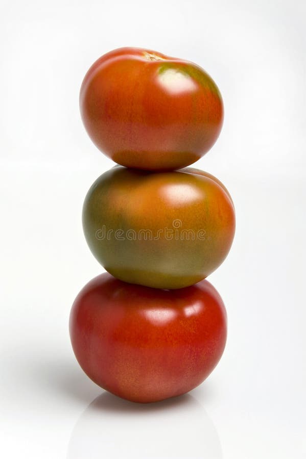Three red tomatoes stock photo. Image of color, freshness - 43630552