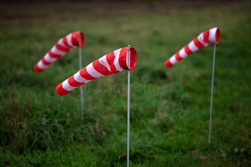 Three Red and White Windsocks Stock Photo - Image of nature, landscape ...