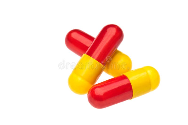 Three Red Yellow Capsules Over White Stock Photo - Image of colour ...