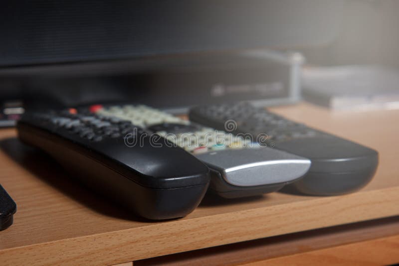 Three remote controls stock photo. Image of control - 102513570
