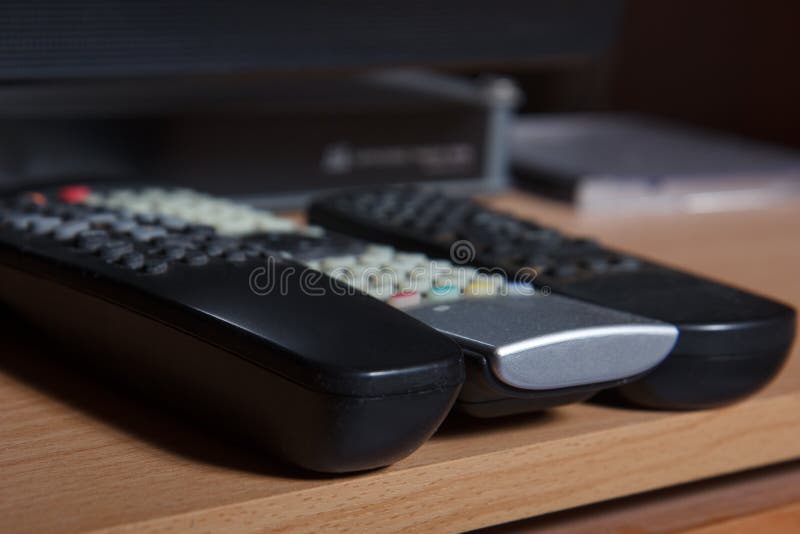 Three remote controls stock photo. Image of closeup - 102585726
