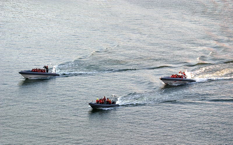 Three rescue boats at sea stock image. Image of europe - 1259599