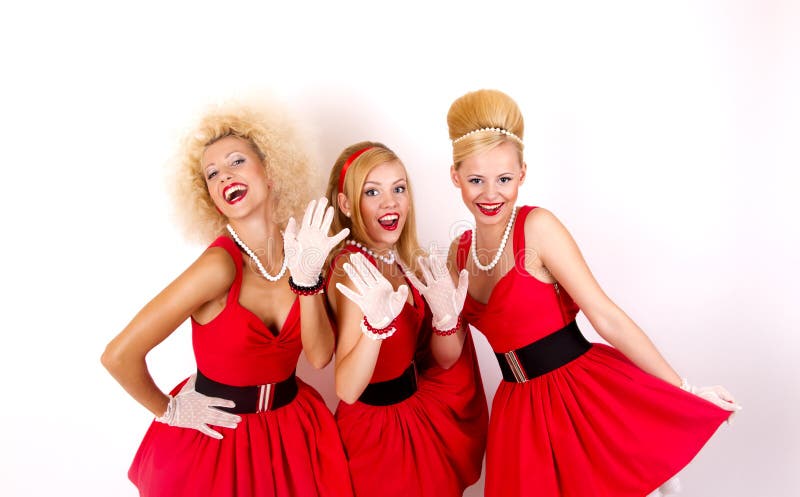 Two Retro Girls Posing in a Red Oldtimer Convertible Stock Image ...
