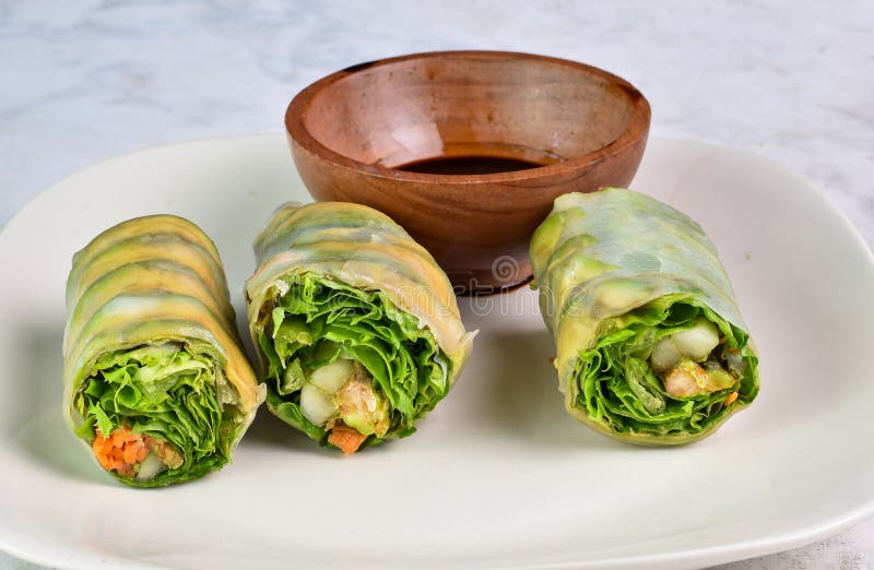 Three Spring Rolls with Soy Sauce Stock Photo - Image of carrot ...