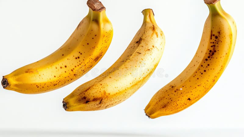 Three Ripe Bananas Falling or Flying, Isolated on White Background ...