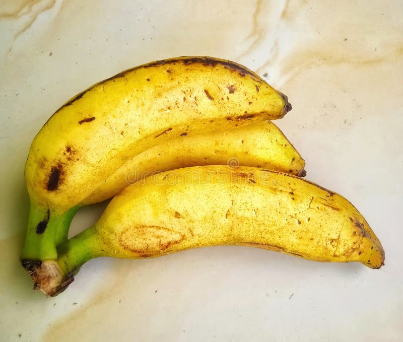 Three Ripe Bananas on the Tile Floor Stock Image - Image of dessert ...