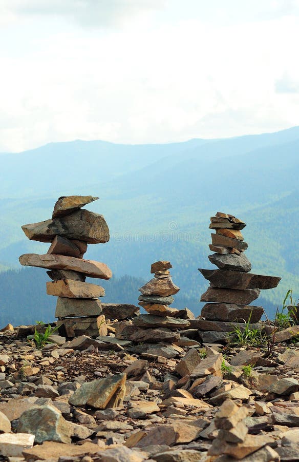 Three Ritual Stone Pyramids on Top of a High Hill Overlooking the Peaks ...