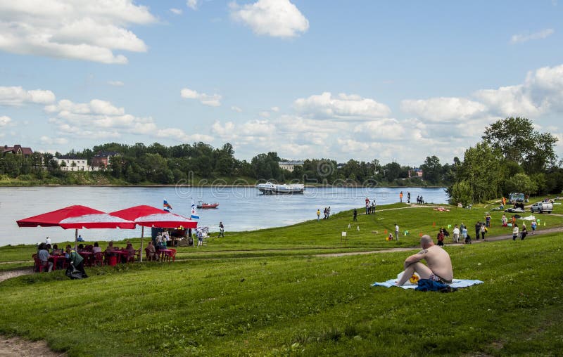 Three at the river. editorial stock photo. Image of grass - 66260468