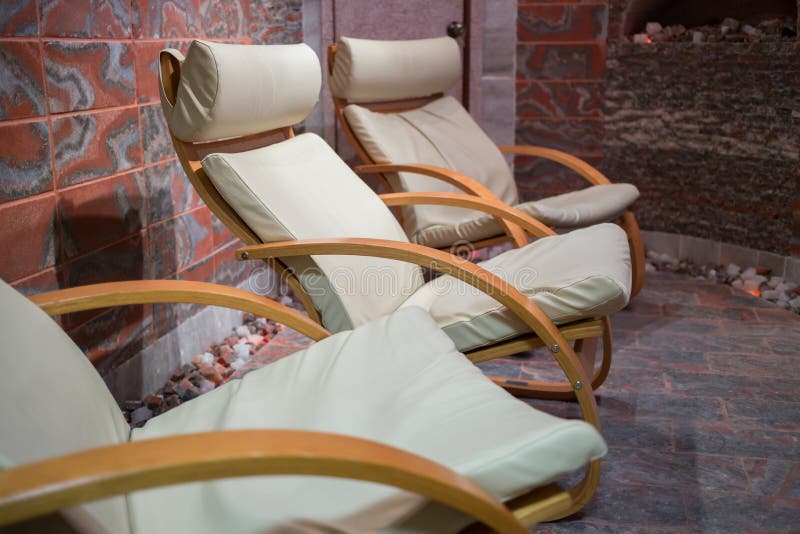 Three Rocking-chairs are Standing in a Marble Stock Photo - Image of ...