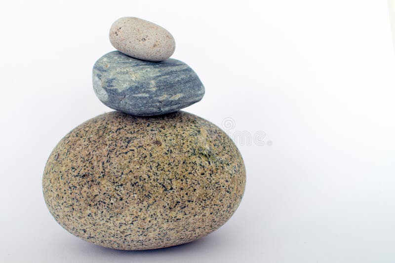 One Smooth Rock in Front of a Pile of Rocks Stock Photo - Image of ...