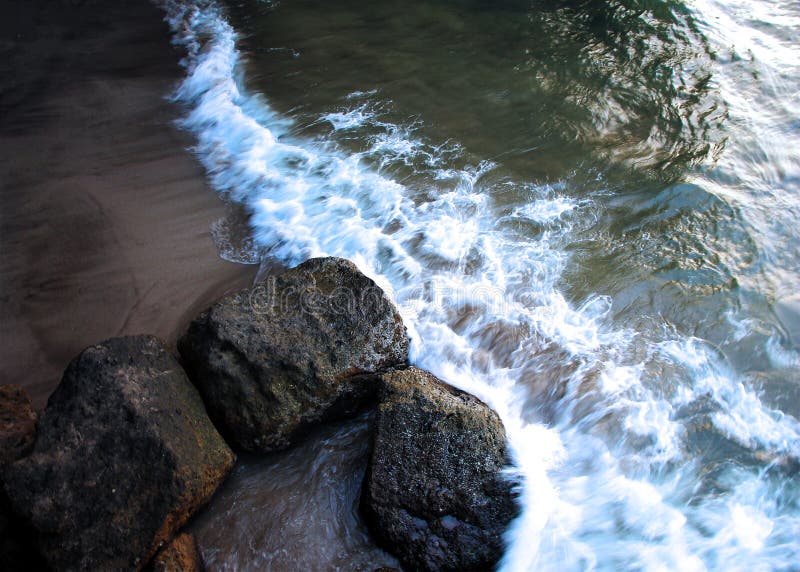 Three Rocks Surrounded by the Sea Stock Photo - Image of nature, rock ...