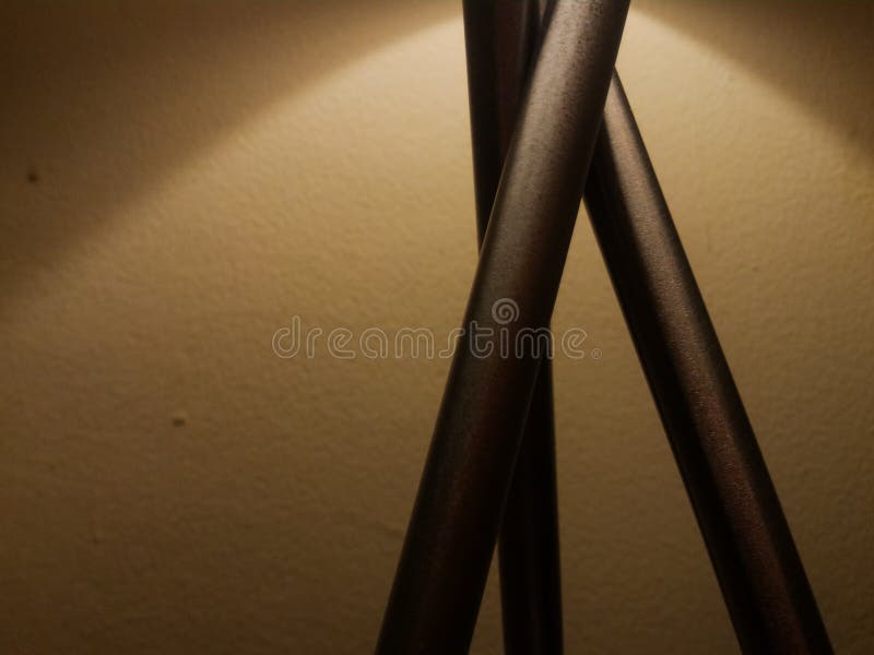 Three rods intertwined stock photo. Image of lamp, light - 110668428