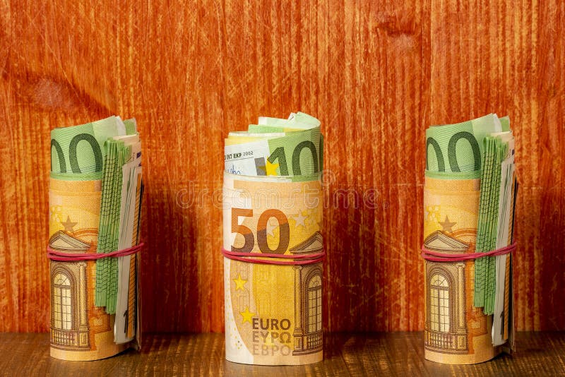 Three Rolls of Euro Currency Stock Image - Image of economy, roll ...