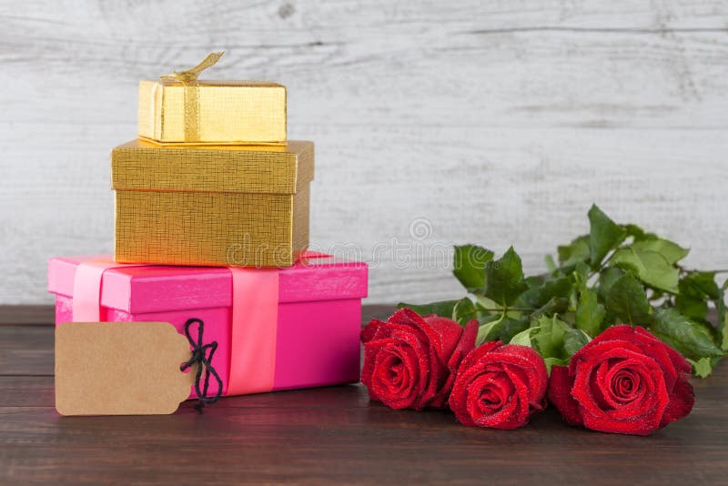 Three Roses and Gift Boxes with Tag Stock Image - Image of holiday ...