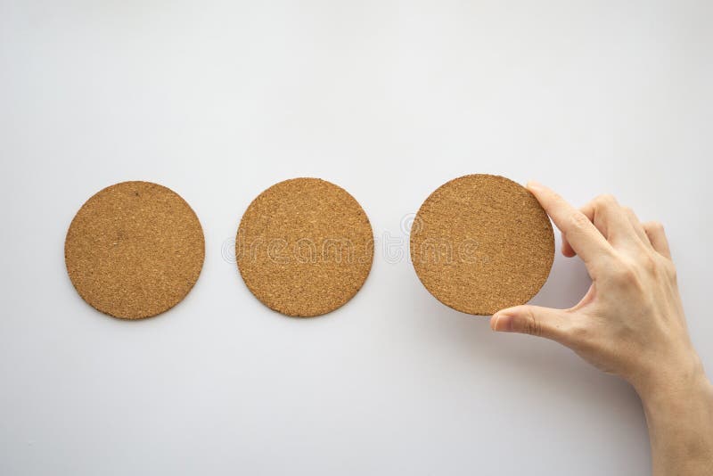 Three Round Cork Board and Hand Selecting the Right Stock Image - Image ...