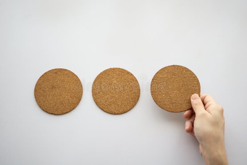 Three Round Cork Board and Hand Selecting the Right Stock Image - Image ...