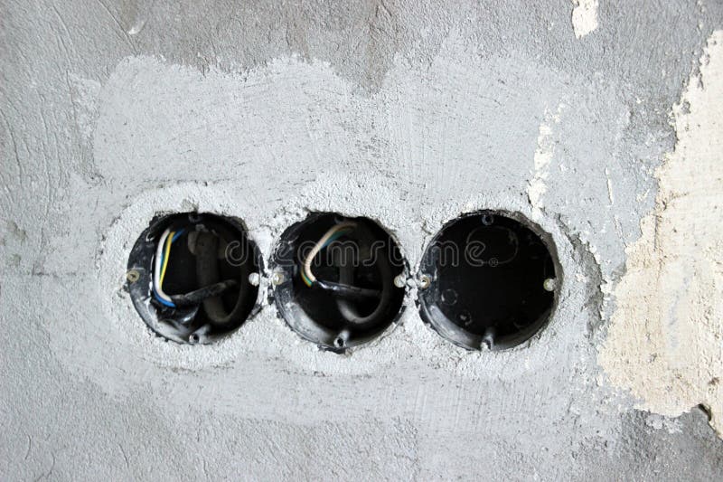 Three Round Holes for Installing Sockets. Inside Them are Wires and ...