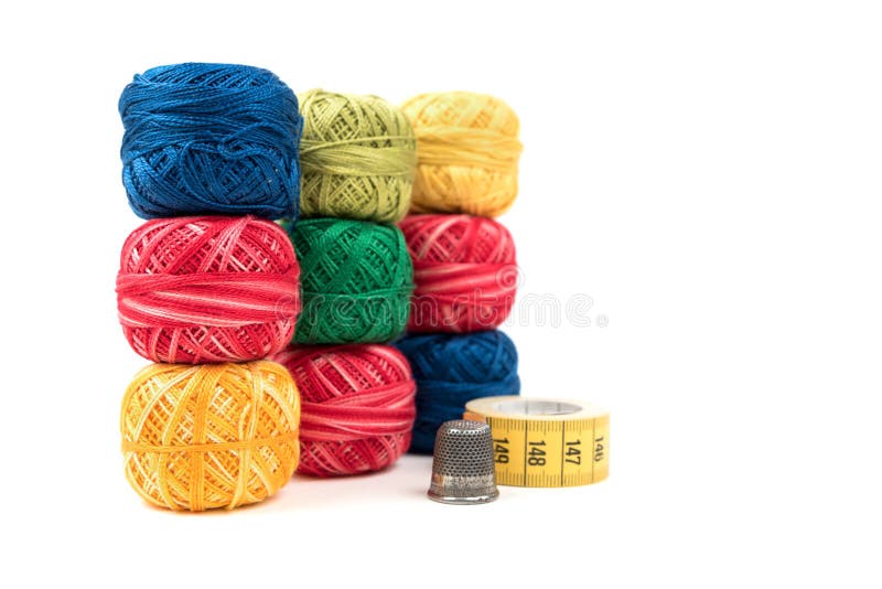 Three Rows of Colored Sewing Threads on a White Background. Colorful ...