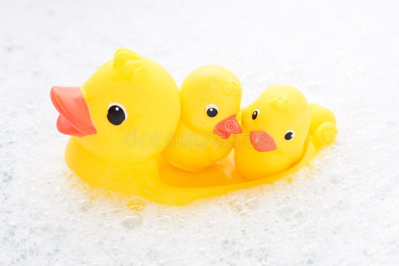 Rubber Ducks Holding Umbrellas Stock Photo - Image of mouth, ducks ...