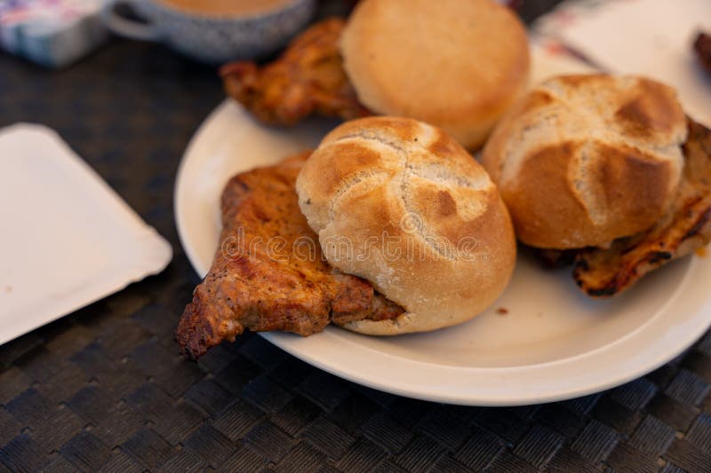 Three Sandwiches are on a White Plate, with One of Them Being a Chicken ...