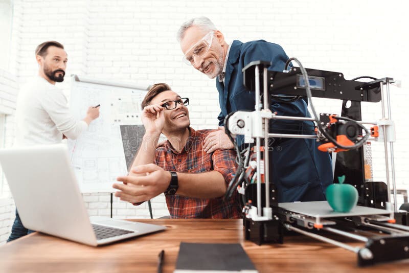 Three Scientists are Involved in Setting Up and Developing 3D Printers ...