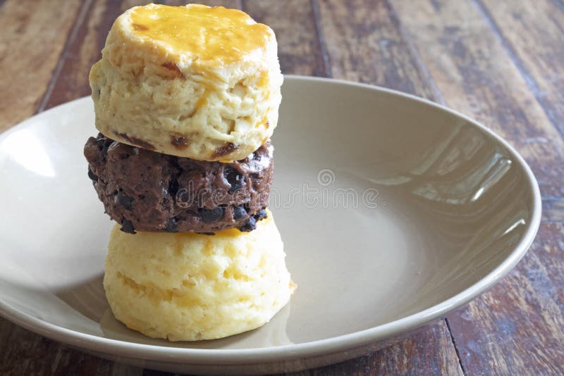 Three scones stacked stock photo. Image of milk, scones - 200046952