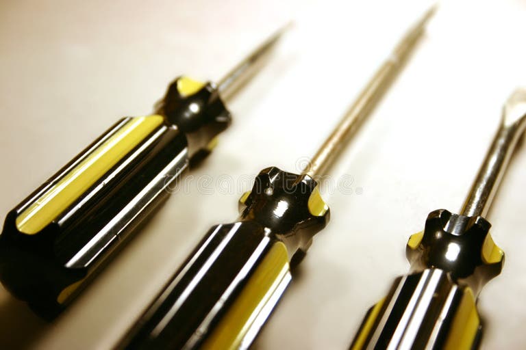 Three screwdrivers stock image. Image of construction, create - 65365