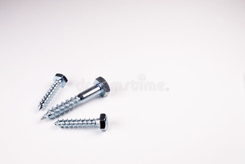 Three Screws on a White Background Stock Image - Image of clincher ...