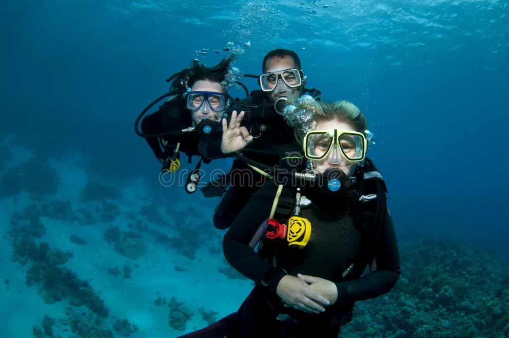 Three scuba divers stock photo. Image of travel, tropical - 15679652
