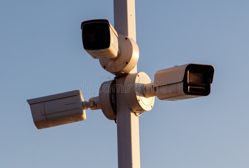 Three Security Cameras are Mounted on a Pole Stock Photo - Image of ...