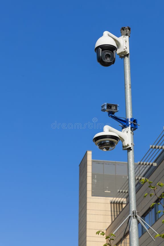 Three Security Cameras on a Pole. Stock Image - Image of night, public ...