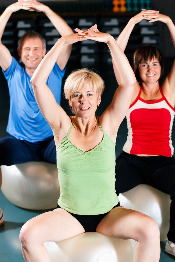 Three senior people in gym stock image. Image of body - 15749415