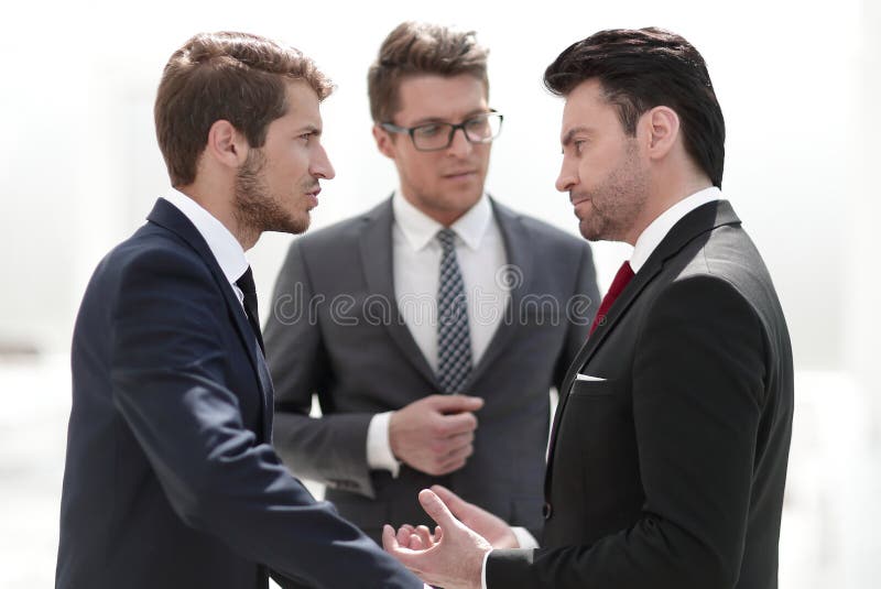 Two businessmen discussing stock image. Image of conversation - 23642309