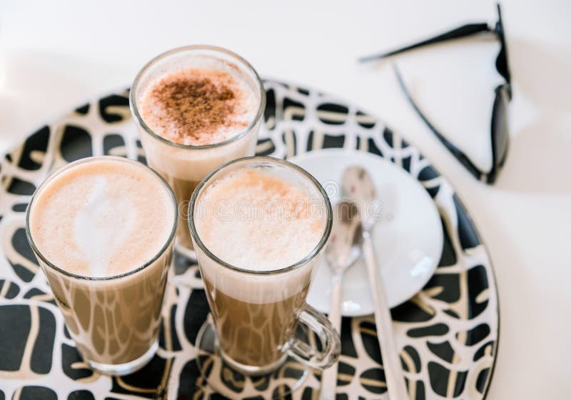 Three servings of latte stock photo. Image of latte - 123566150