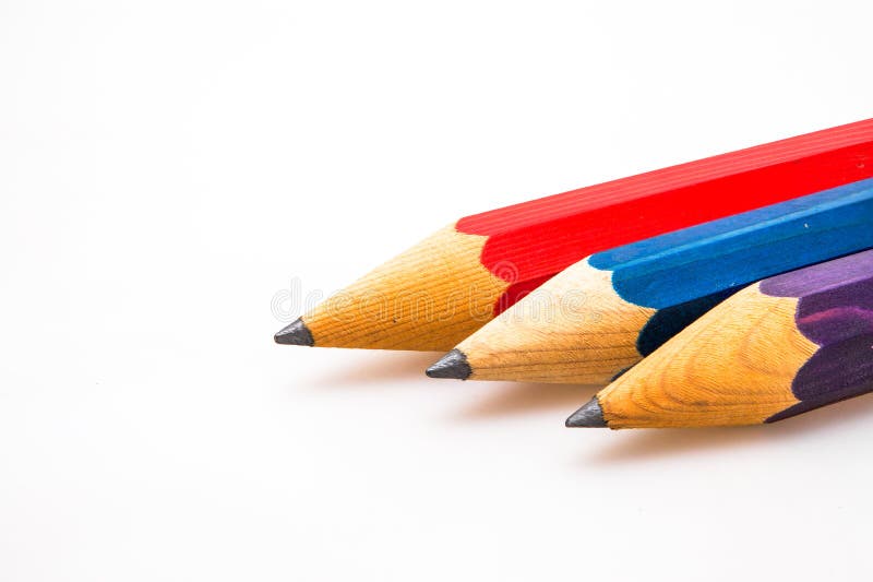 Three Sharp Thick Pencils and Lined Paper Stock Photo - Image of ...
