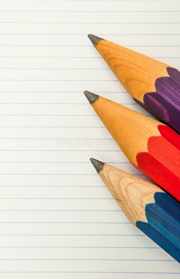 Three Sharp Thick Pencils and Lined Paper Stock Photo - Image of ...