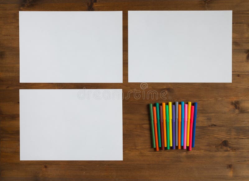 Three Sheet of Paper and Colored Markers Stock Photo - Image of torn ...
