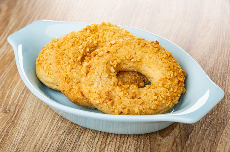 Shortbread Rings in Oval Blue Plate on Wooden Table Stock Image - Image ...