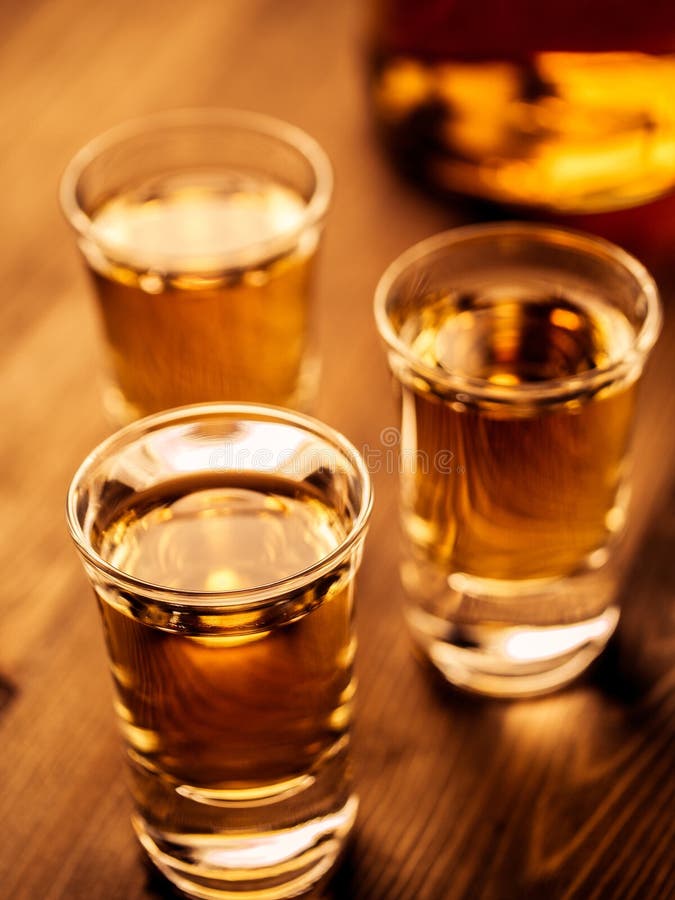 Three shots stock image. Image of yellow, vintage, tequila - 51719151