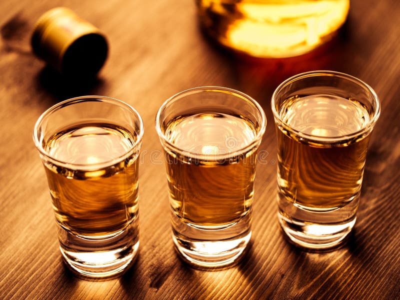 Three shots stock image. Image of bottle, liquor, glass - 51719345