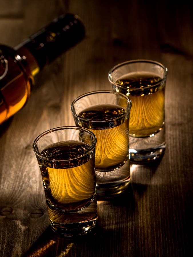 Three shots stock image. Image of three, liquid, shadow - 50594879