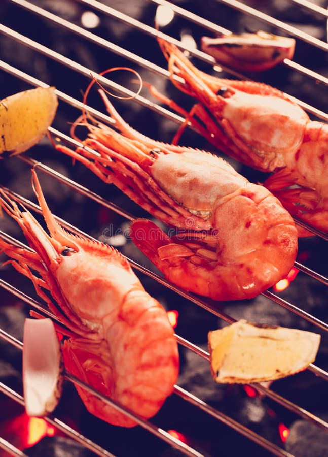 Three Shrimp on a grill stock image. Image of barbecue - 56072055