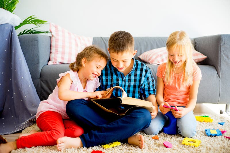 Three Siblings Reading a Book Stock Image - Image of child, preschool ...