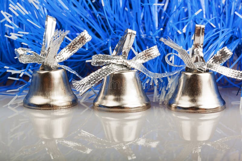 Three silver bells stock image. Image of blue, decoration - 35737501