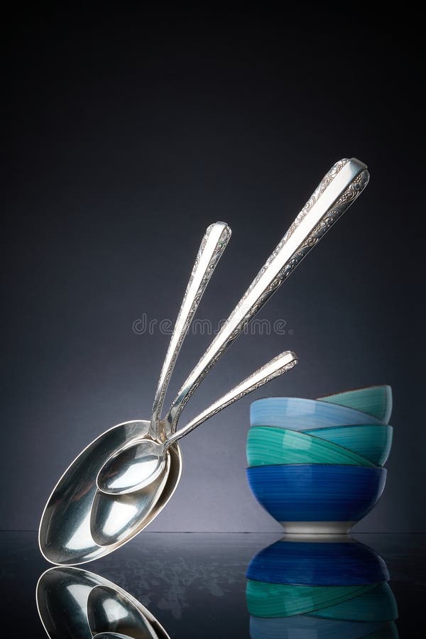 Three Silver Spoons in Balance Stock Image - Image of elegant, classy ...