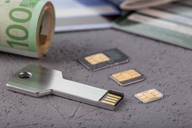 Three SIM Cards of Different Sizes Lie on a Rough Surface. Close-up ...