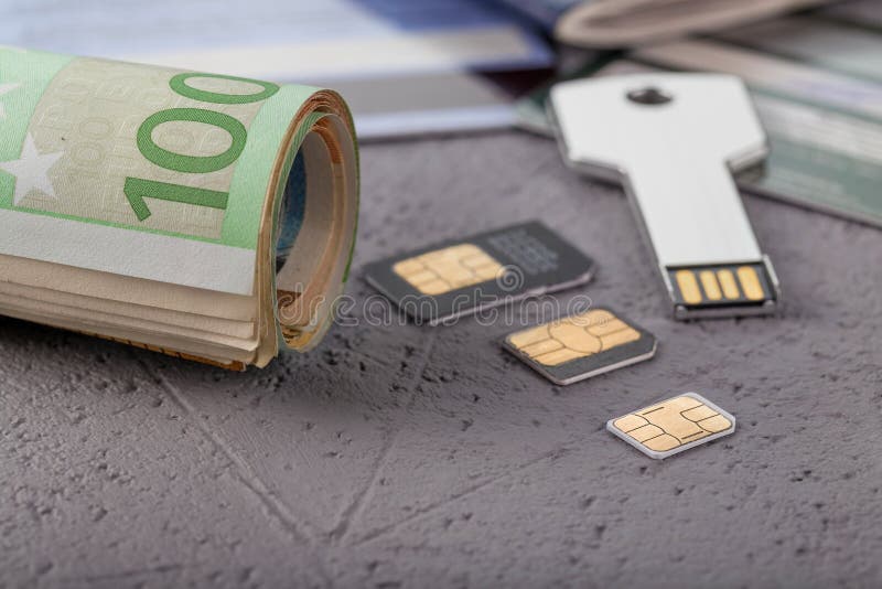 Three SIM Cards of Different Sizes Lie on a Rough Surface. Close-up ...