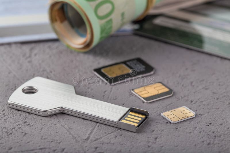 Three SIM Cards of Different Sizes Lie on a Rough Surface. Close-up ...