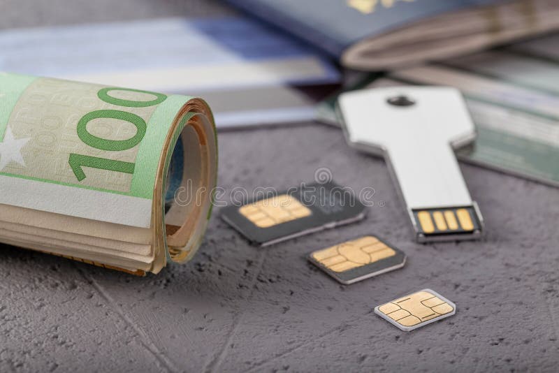 Three SIM Cards of Different Sizes Lie on a Rough Surface. Close-up ...