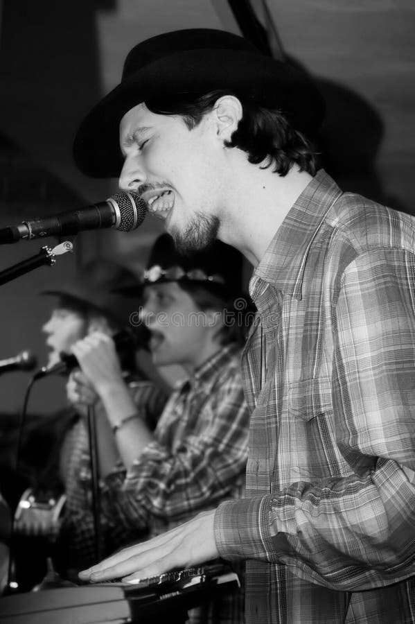 Three Singers with Microphone Stock Photo - Image of game, concert: 4580512